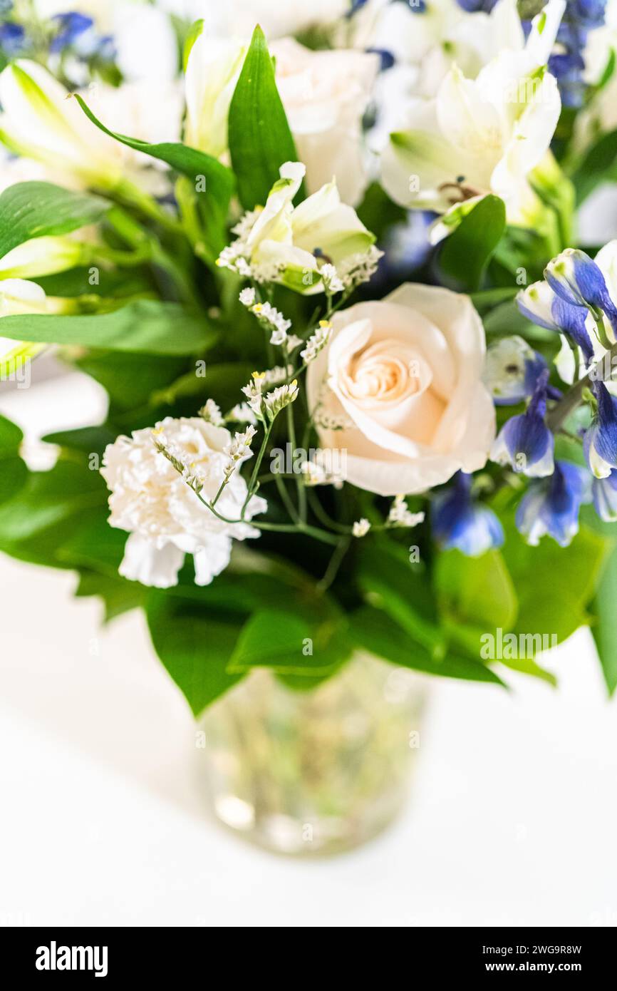 Elegant White Rose Bouquet Adorns a Beautiful Vase Stock Photo - Alamy