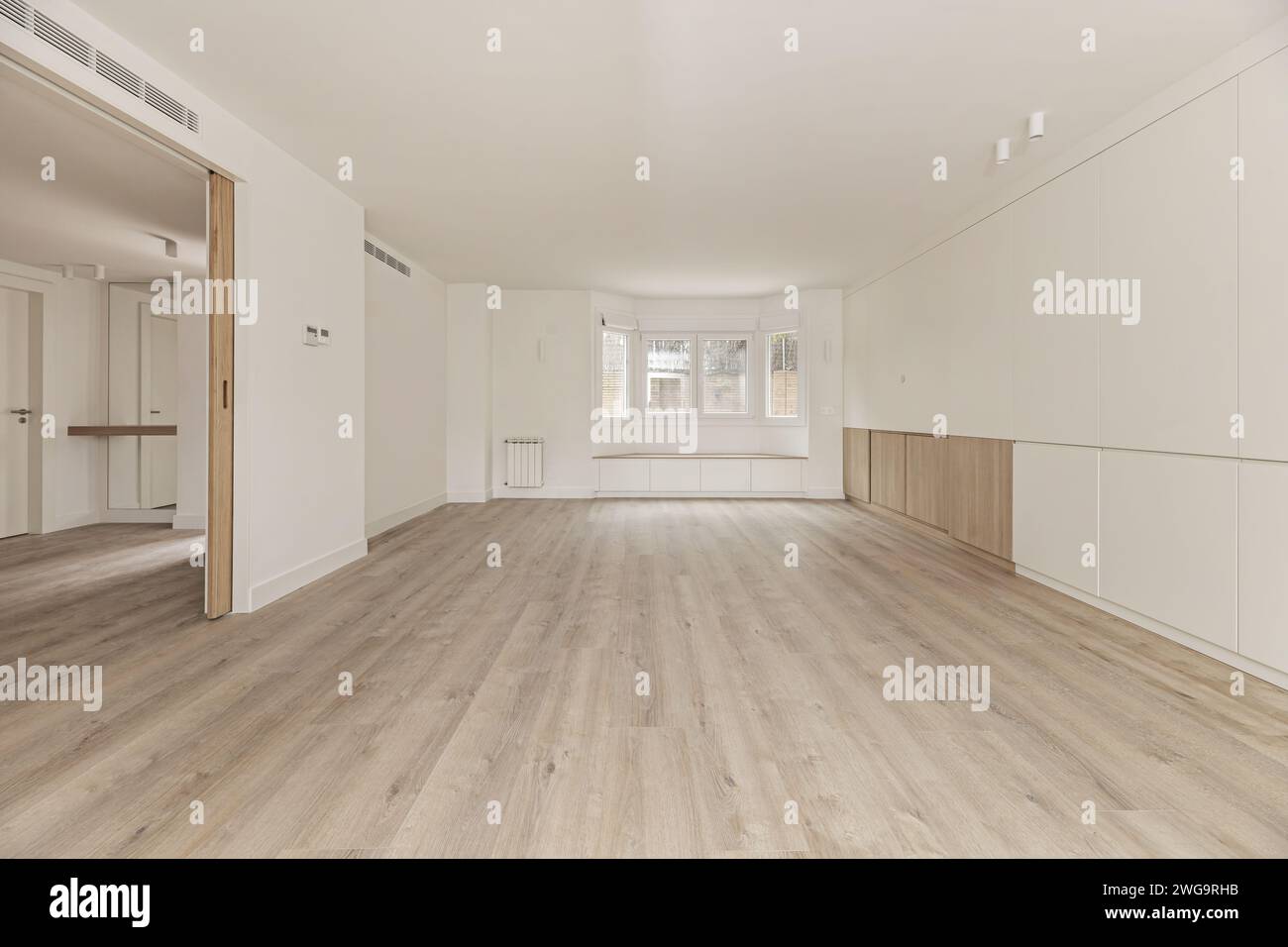 Large empty living room of a multi-story single-family home with ...