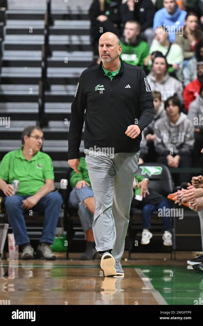 North Dakota Fighting Hawks head coach Paul Sather walks the court ...