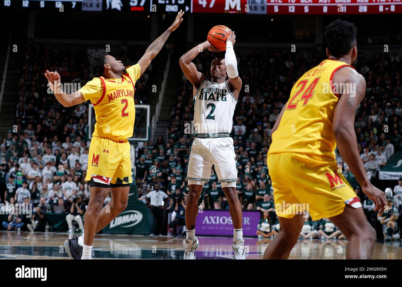 Michigan State guard Tyson Walker, center, shoots against Maryland ...