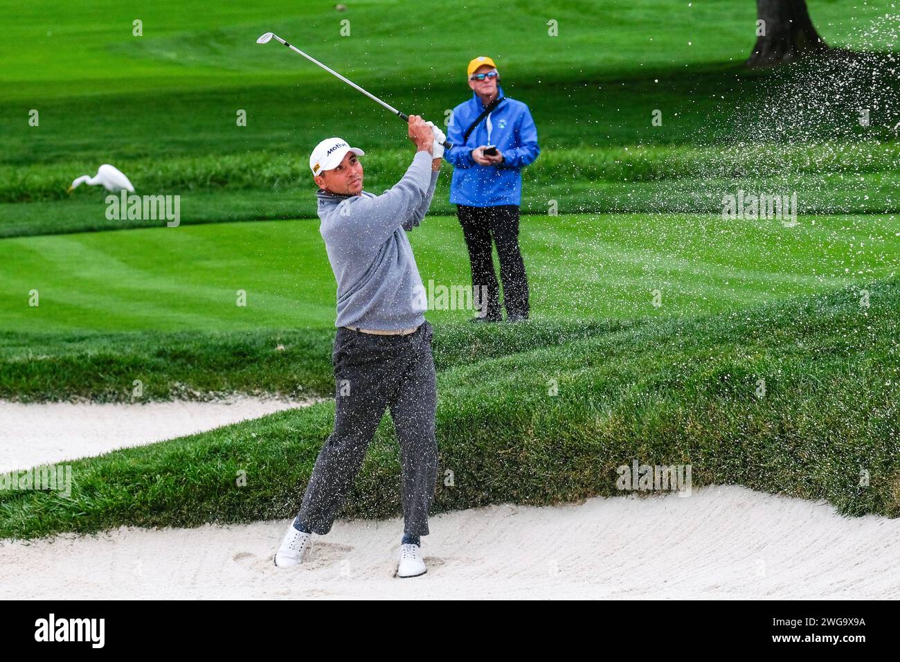 PEBBLE BEACH, CA - FEBRUARY 03: Jason Day powers out of the right ...