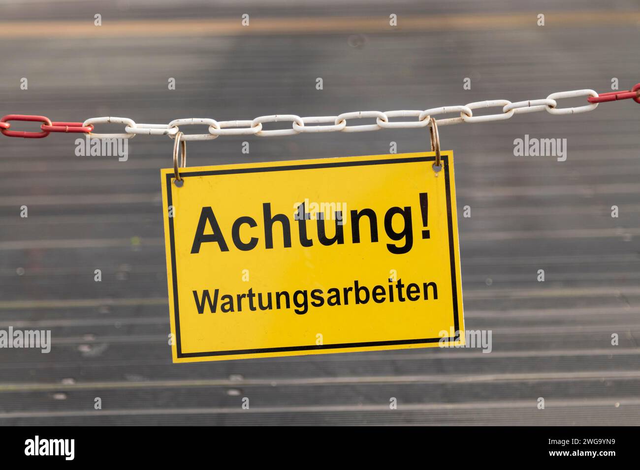 Symbolic image barrier, construction site, repair, close-up of a chain ...