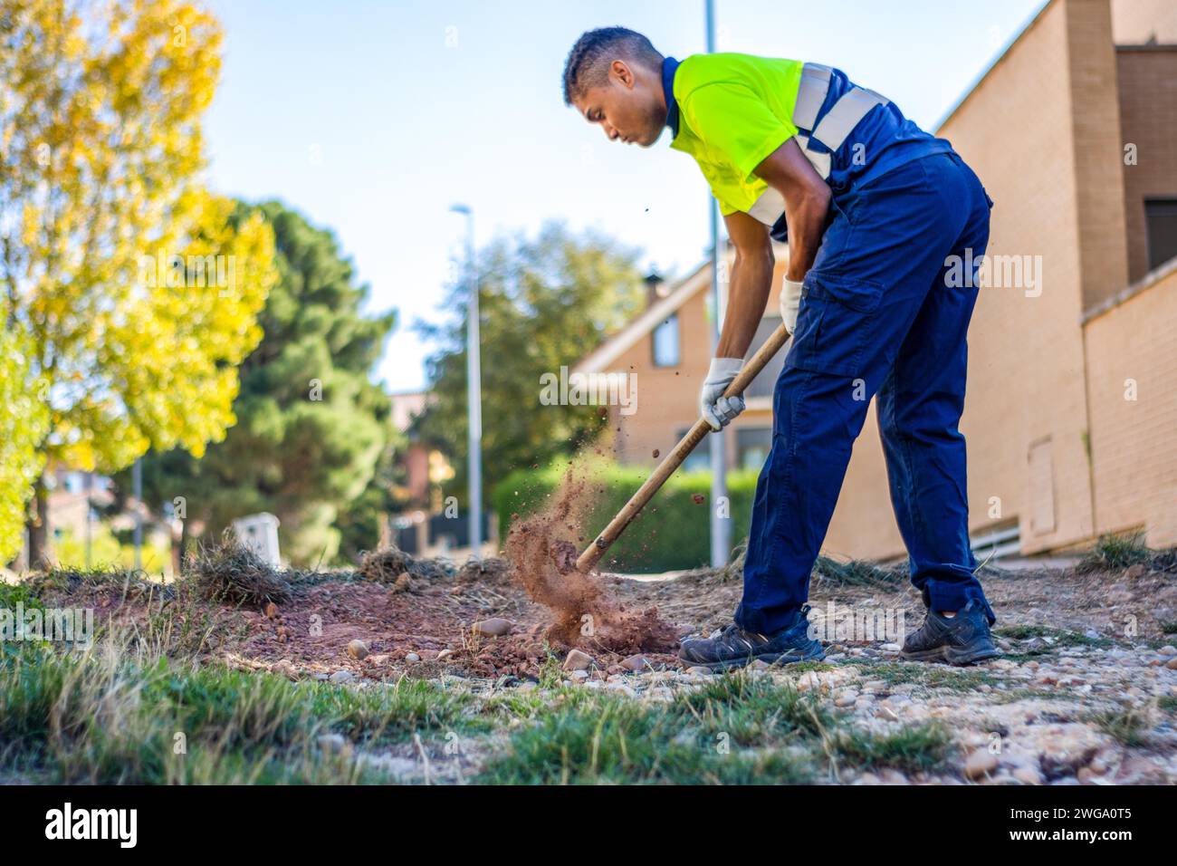 Man working plowing land hi-res stock photography and images - Alamy