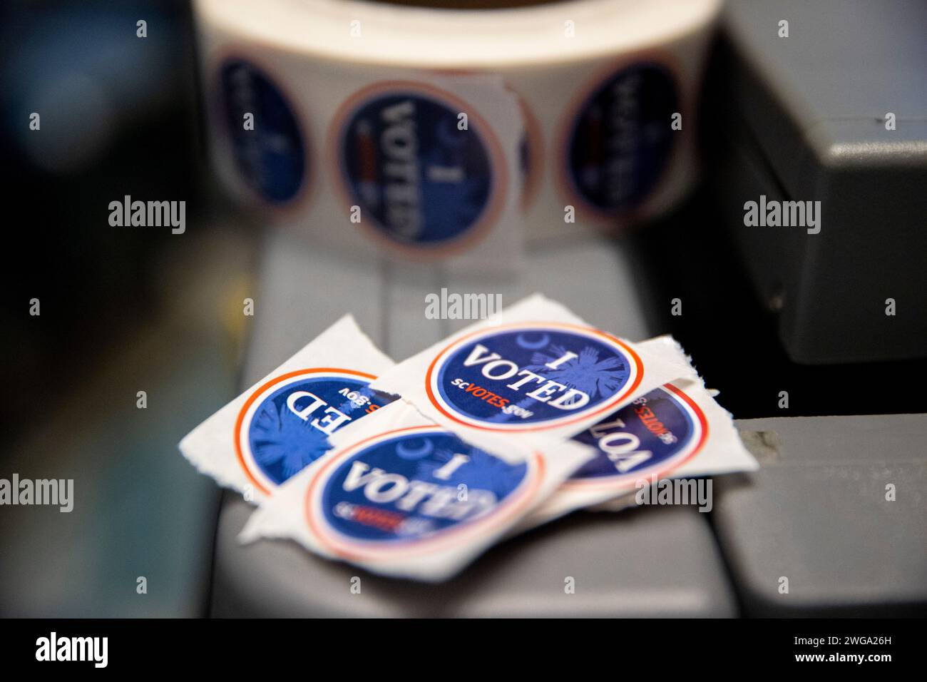 Washington, USA. 3rd Feb, 2024. Voting souvenir stickers are seen at a ...