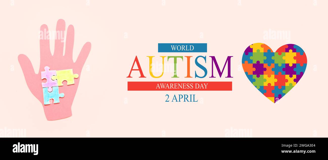 Paper human palm with puzzle pieces and text WORLD AUTISM AWARENESS DAY ...