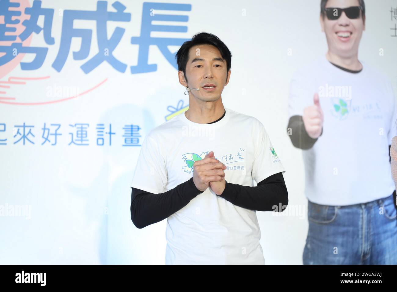 Taiwanese actor, television host and singer Lee Lee-zen attends a public welfare activity in ...