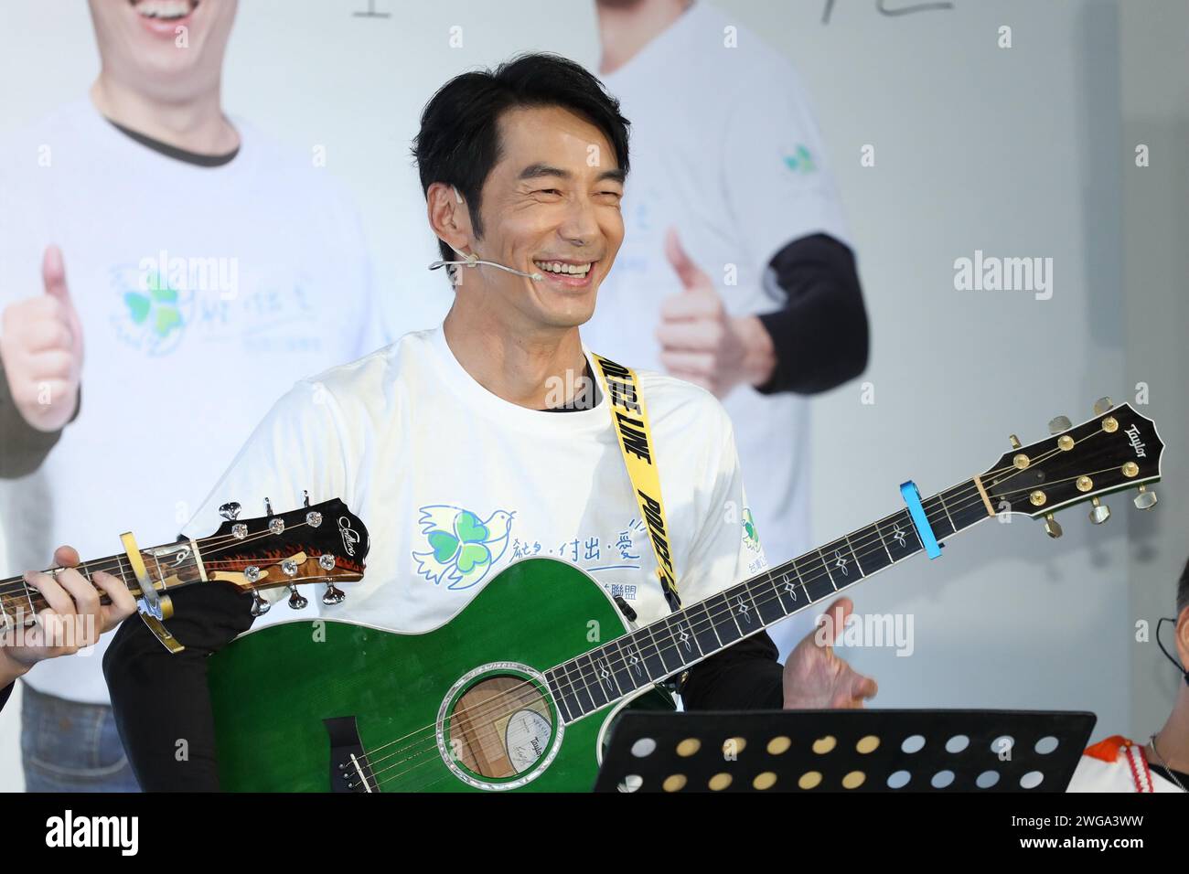 Taiwanese actor, television host and singer Lee Lee-zen attends a public welfare activity in ...