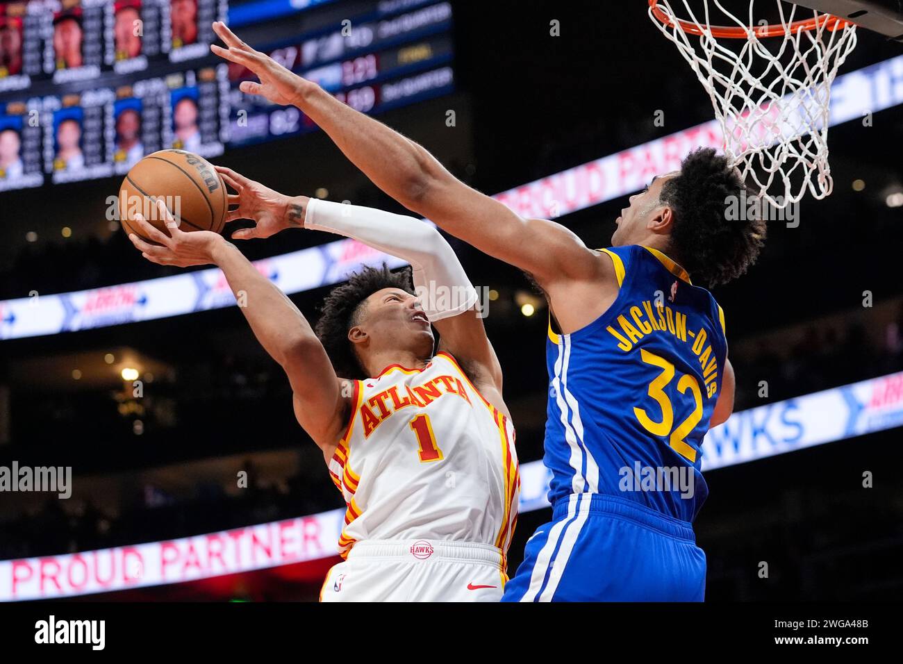 Atlanta Hawks forward Jalen Johnson (1) is guarded by Golden State ...