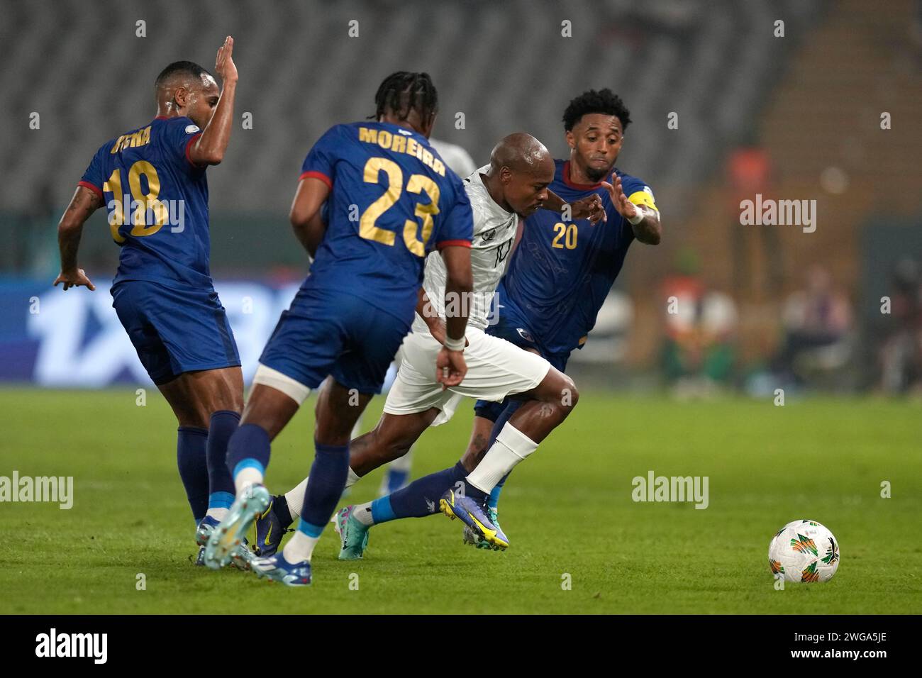 South Africa's Percy Tau, second from right is challenged by Cape Verde ...