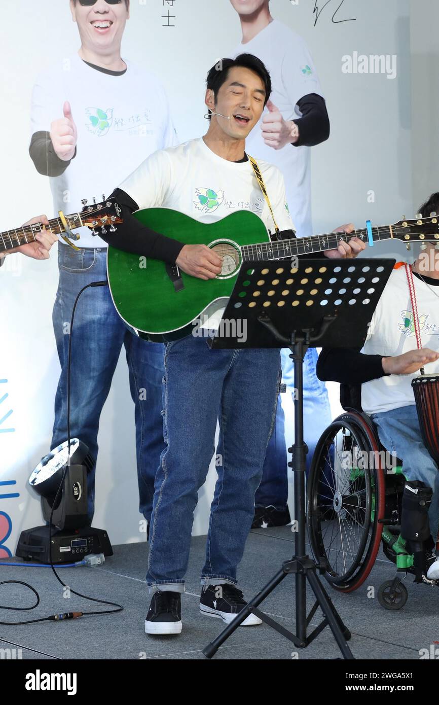 Taiwanese actor, television host and singer Lee Lee-zen attends a public welfare activity in ...