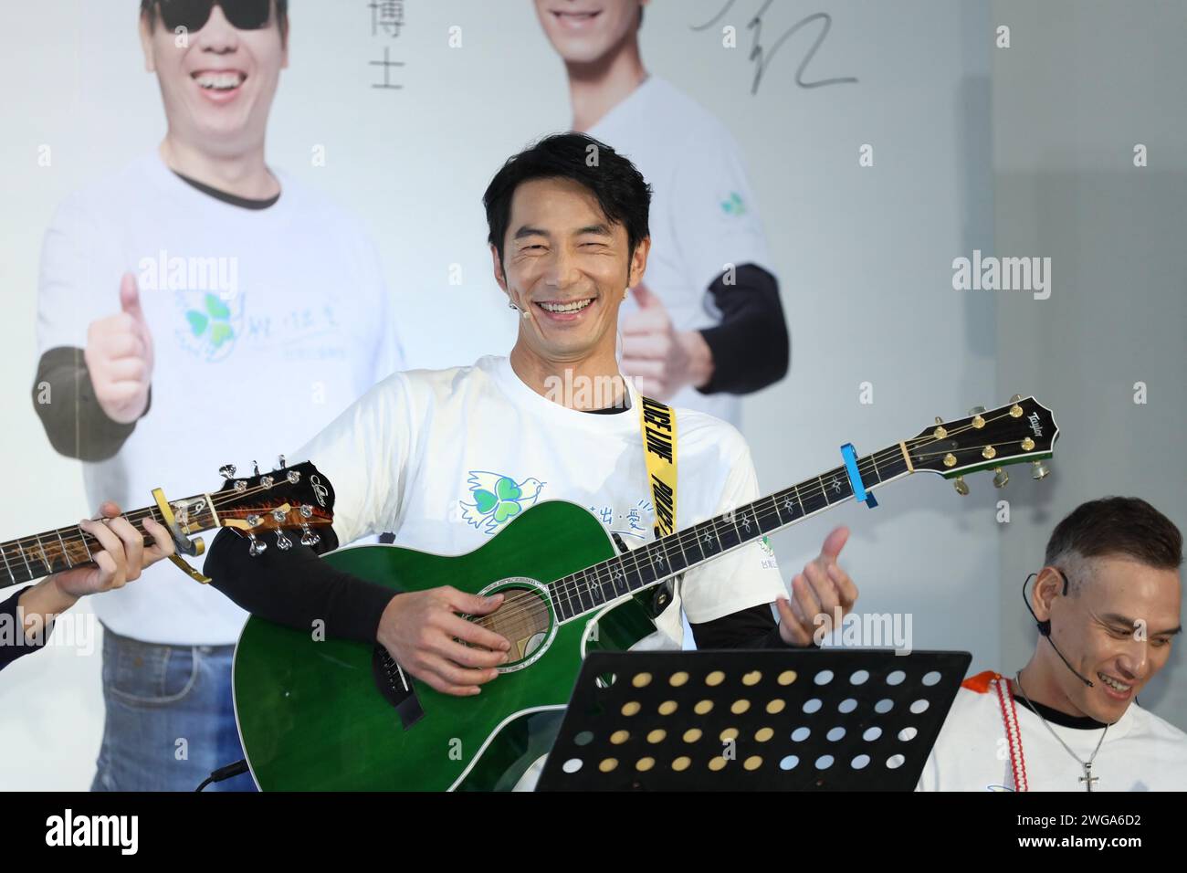 Taiwanese actor, television host and singer Lee Lee-zen attends a public welfare activity in ...