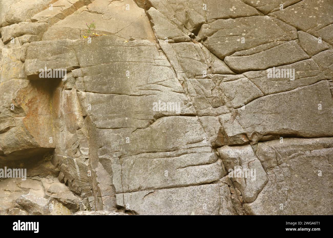 Light coarse natural rock stone background. Mining cliff rough front ...