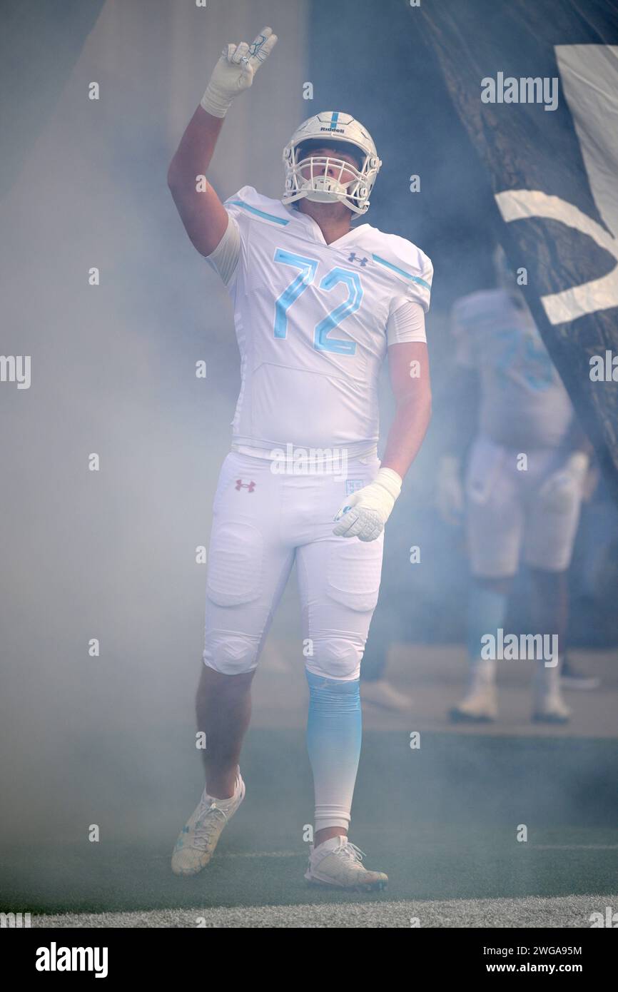 Team Ice offensive lineman Ellis Davis (72) runs onto the field during ...