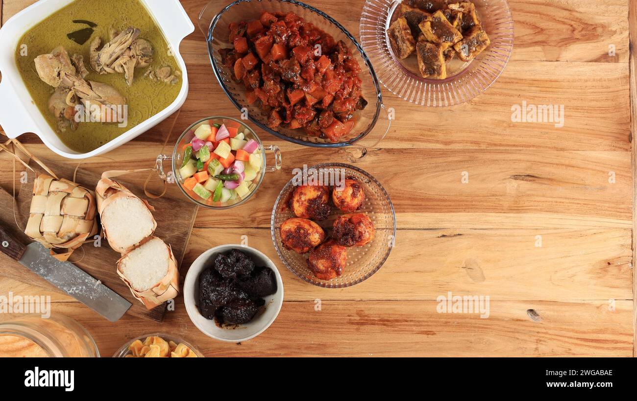 Top View Indonesian Eid Menu Ketupat Full Set with Opor Ayam, and ...