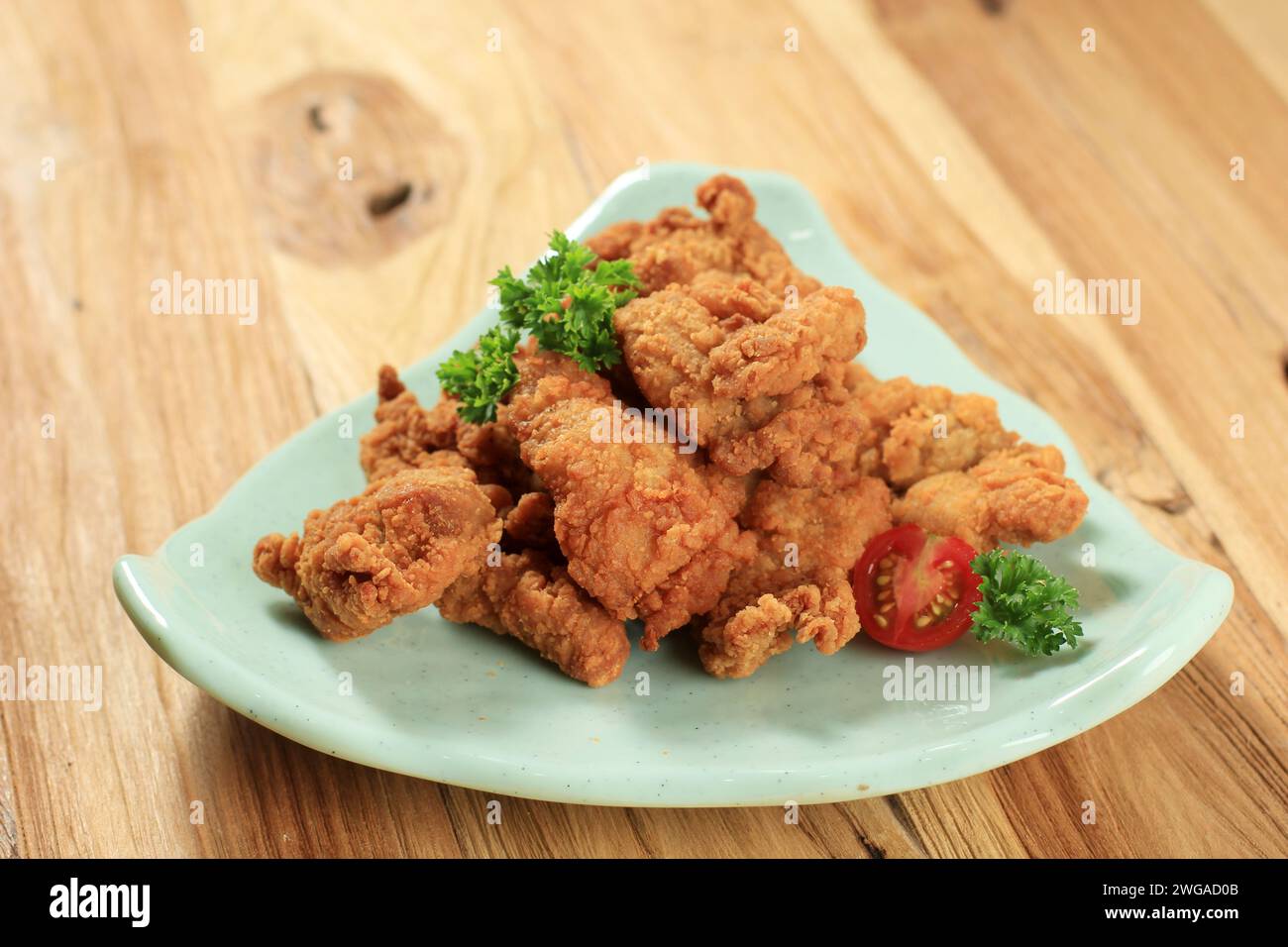 Tatsuta Age, Japannese Style Crispy Fried Chicken on Wooden Table Stock ...