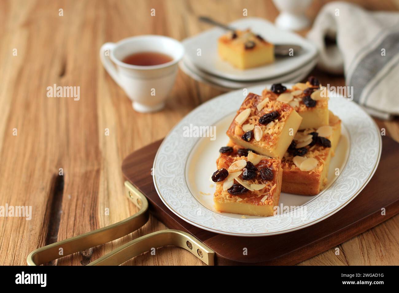 Sliced Homemade Prol Tape or Bolu Tapai on White Plate. Prol Tape is ...