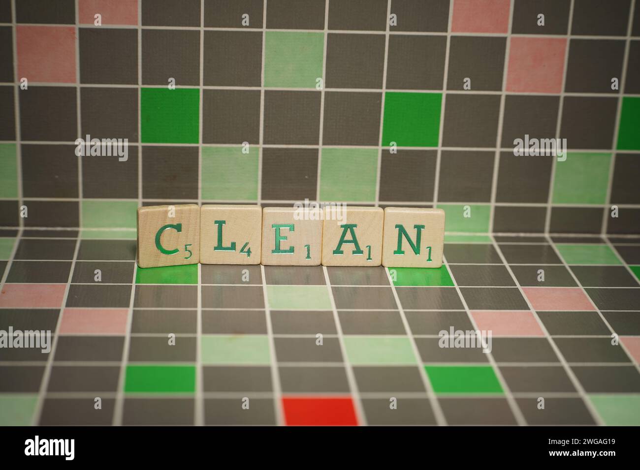 Wooden tile with green clean text on a blocked background Stock Photo ...