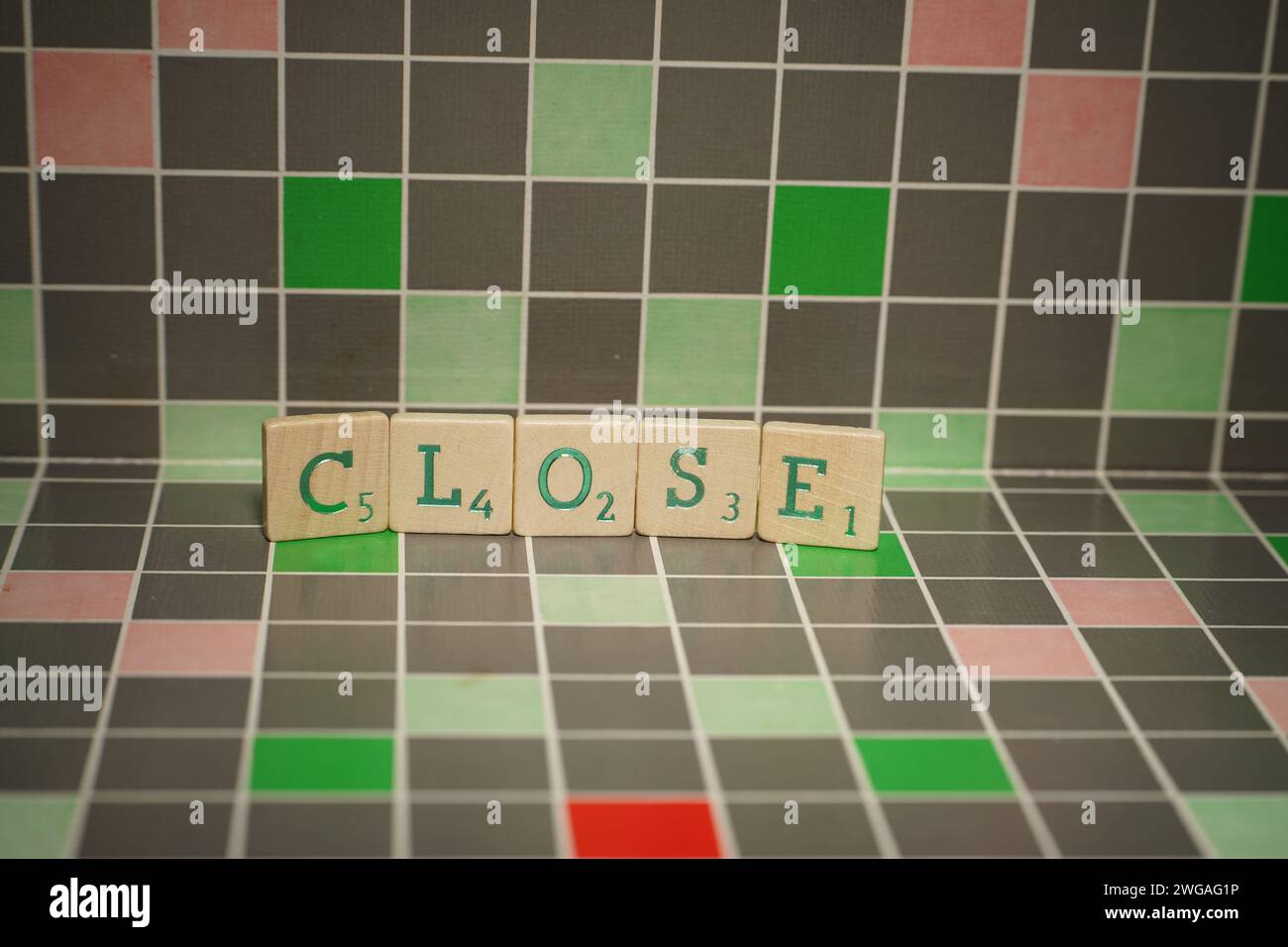 Wooden tile with green close text on a blocked background Stock Photo ...