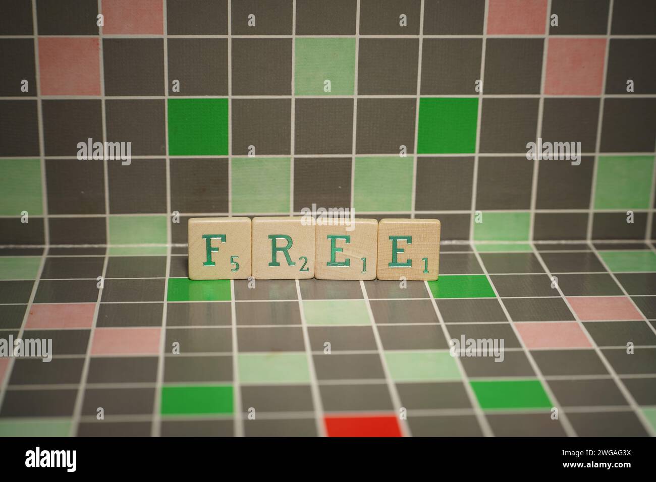 Wooden tile with green free text on a blocked background Stock Photo ...