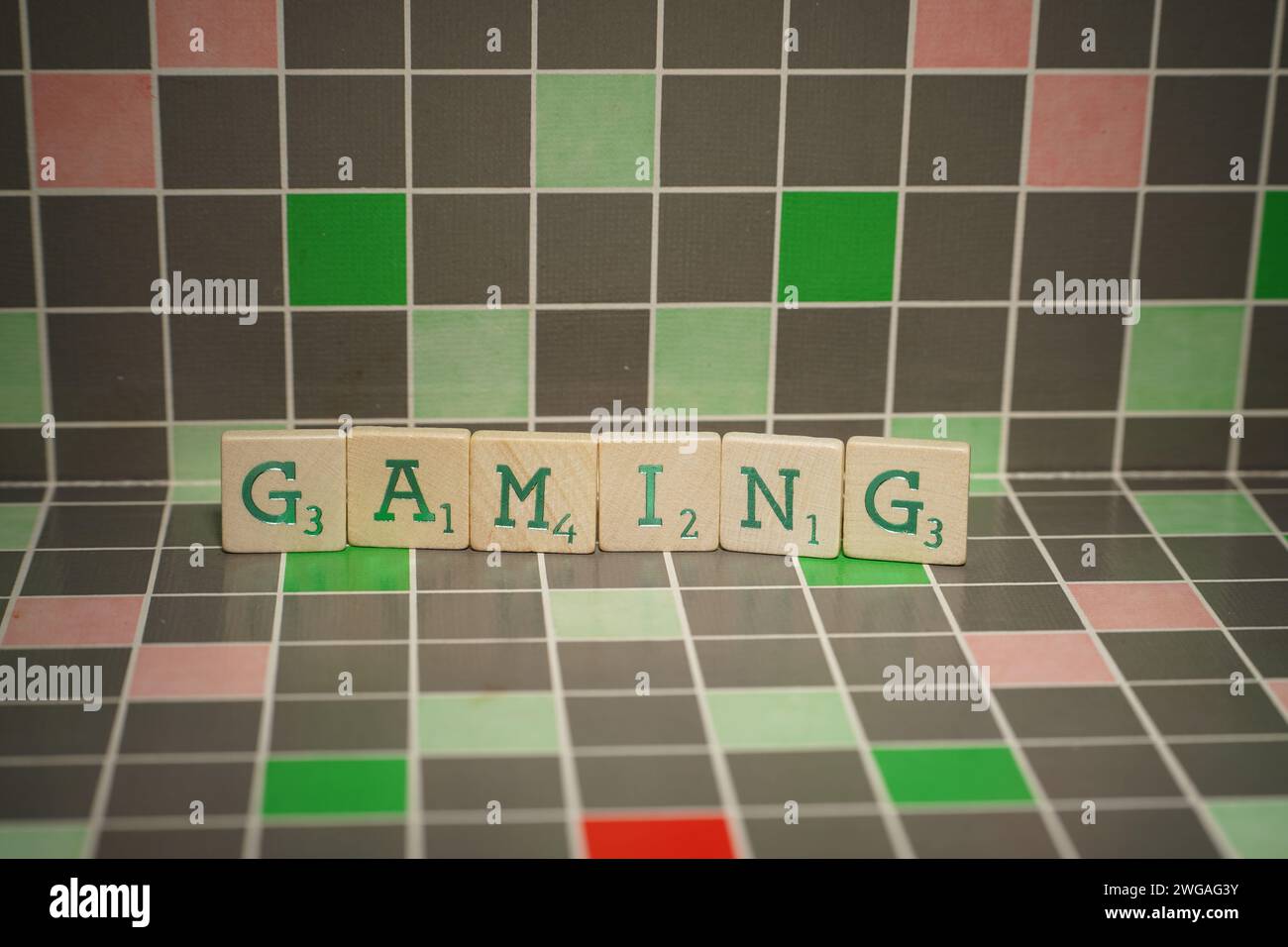 Wooden tile with green gaming text on a blocked background Stock Photo ...