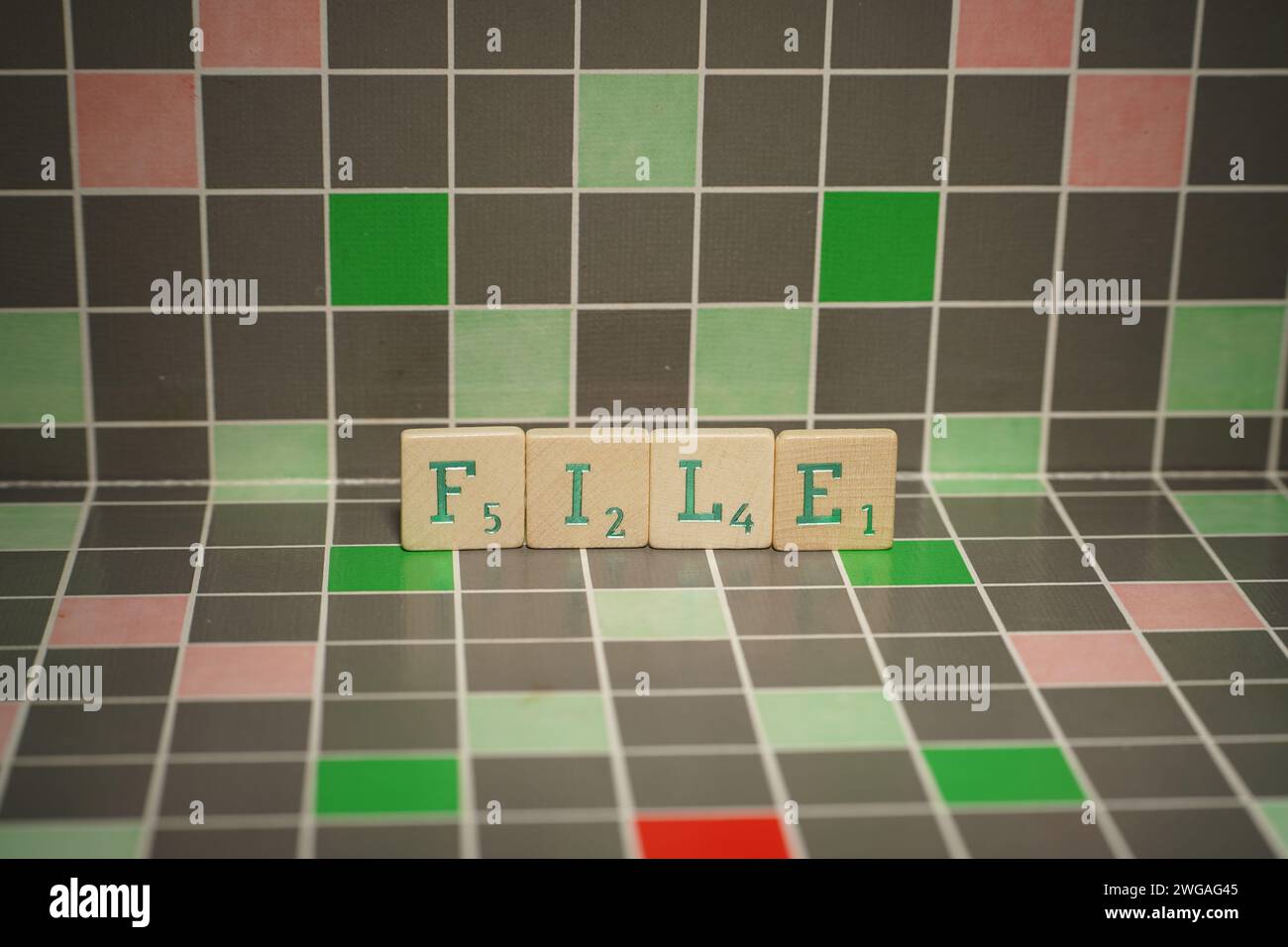 Wooden tile with green file text on a blocked background Stock Photo ...