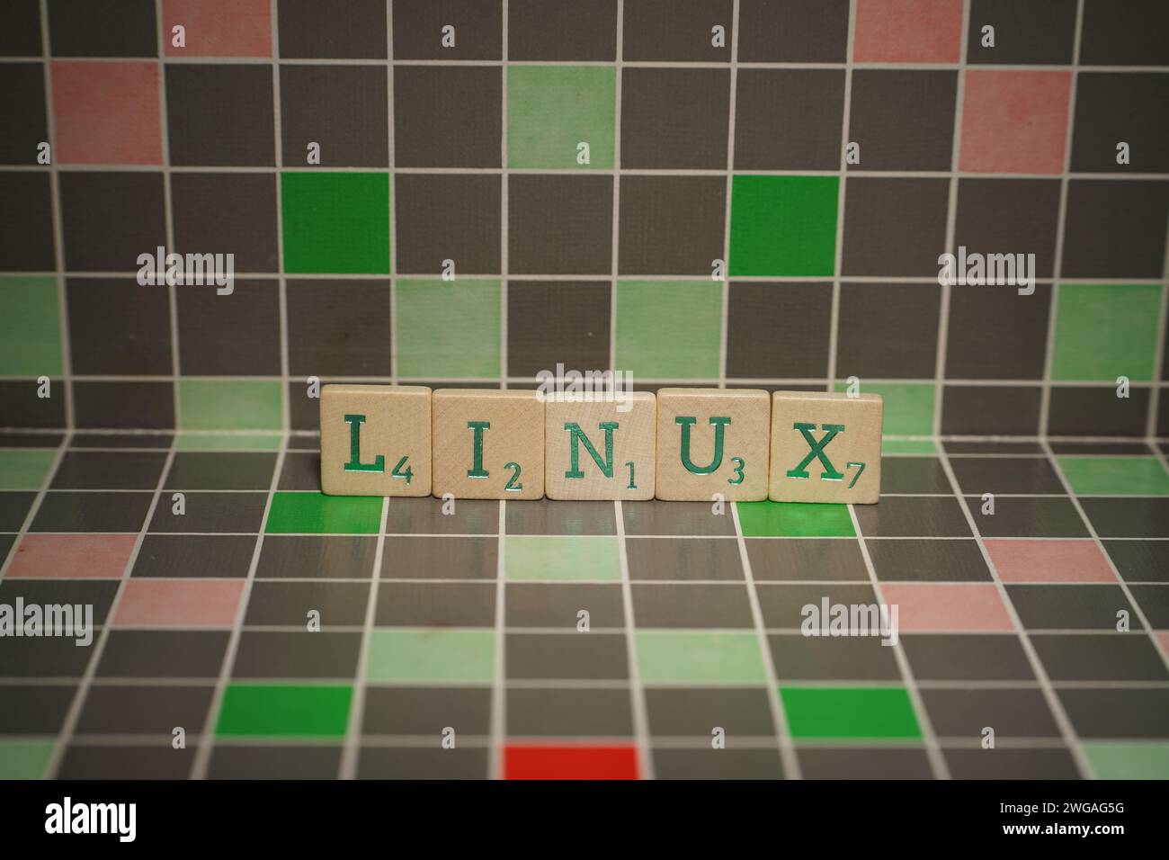 Wooden tile with green linux text on a blocked background Stock Photo ...