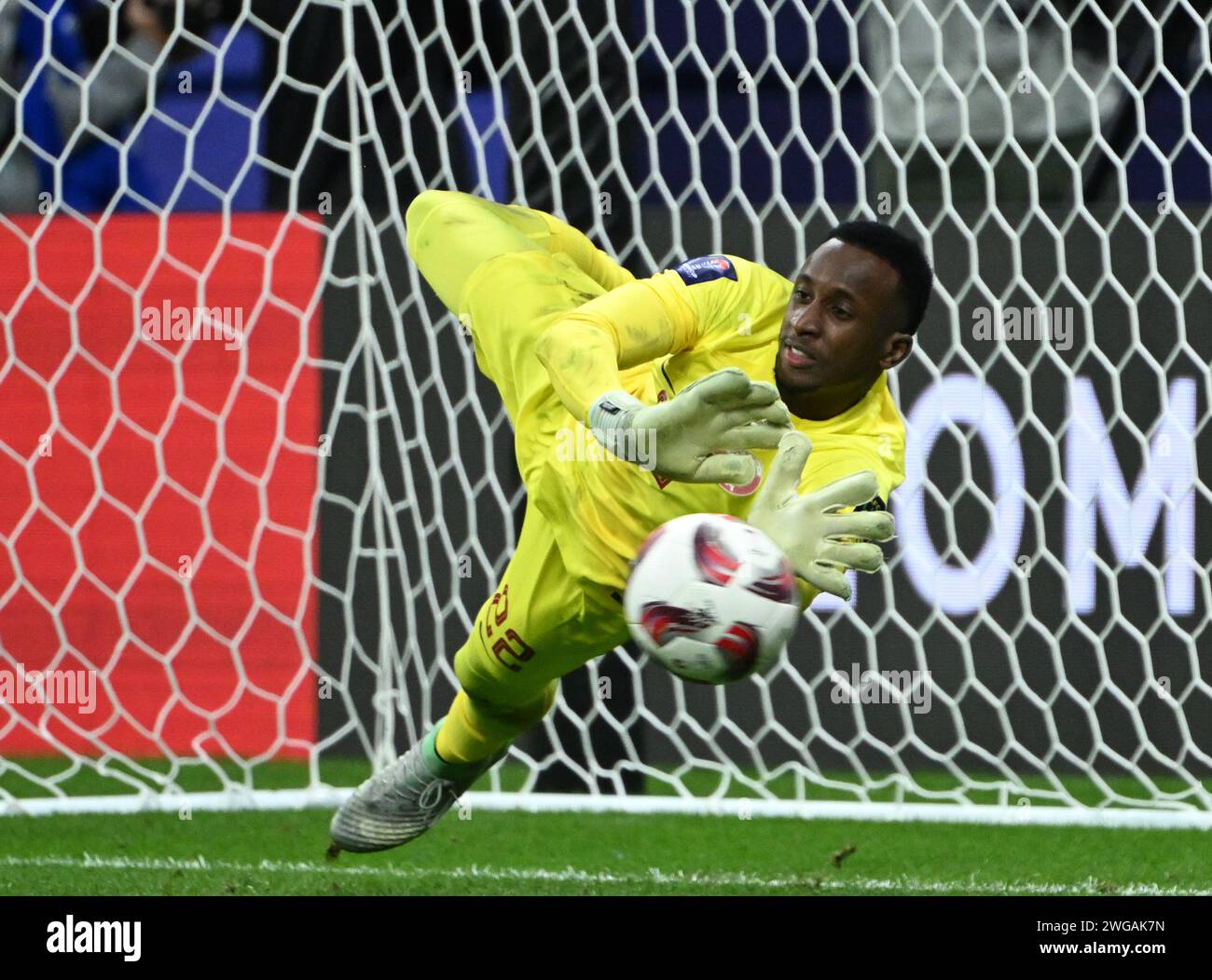 Doha, Qatar. 3rd Feb, 2024. Meshaal Barsham, goalkeeper of Qatar, makes ...