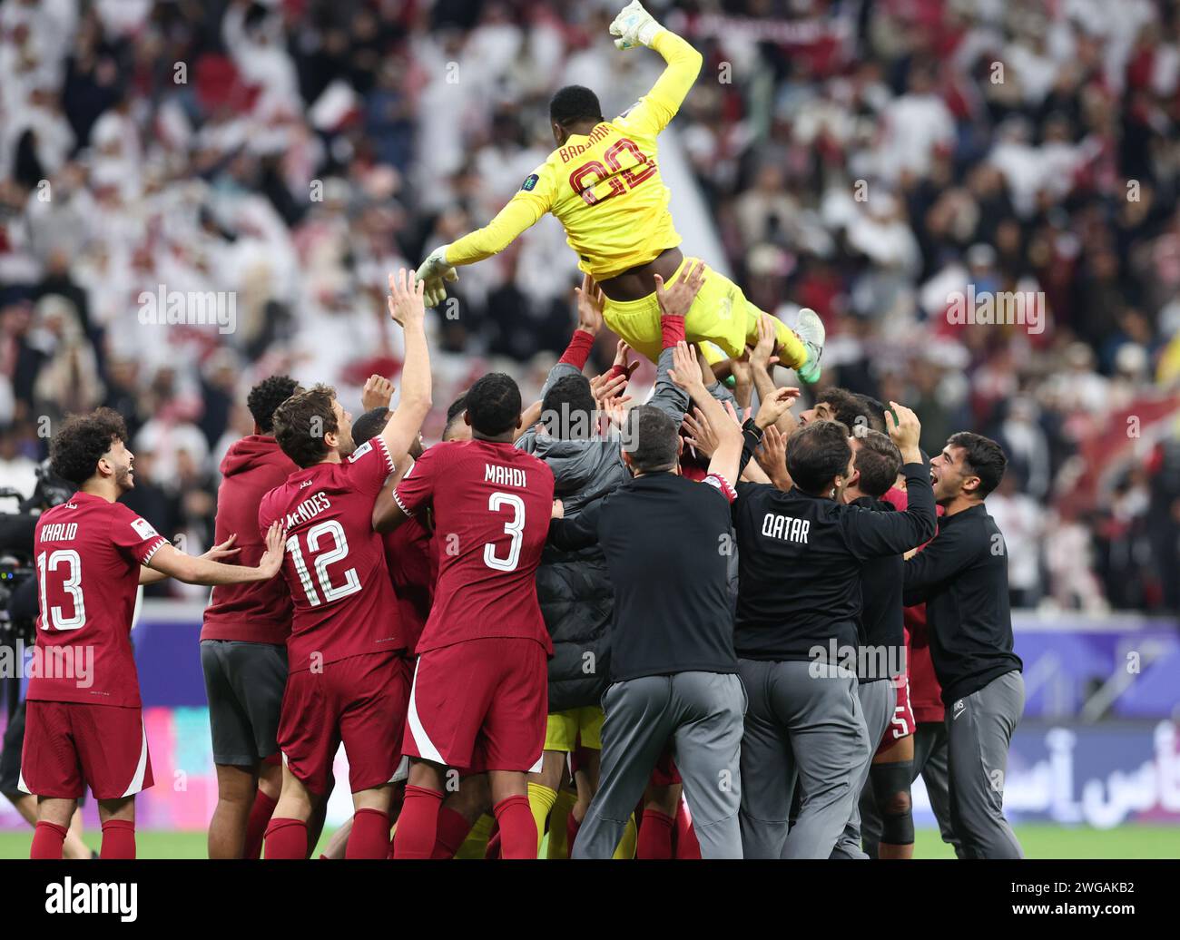 Doha, Qatar. 3rd Feb, 2024. Meshaal Barsham (top), goalkeeper of Qatar ...