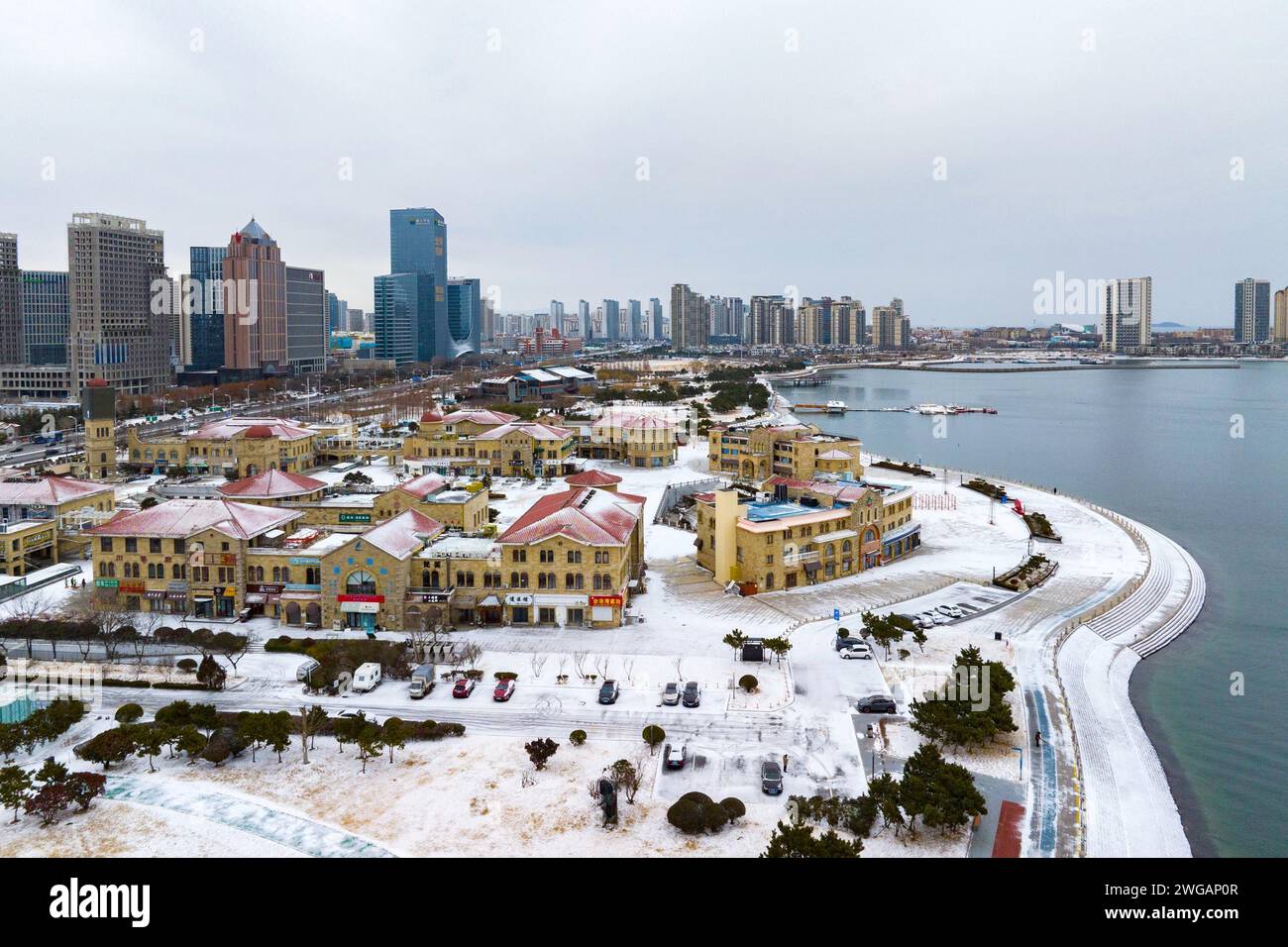 Aerial photos show the snow scenery at the West Coast New Area of ...