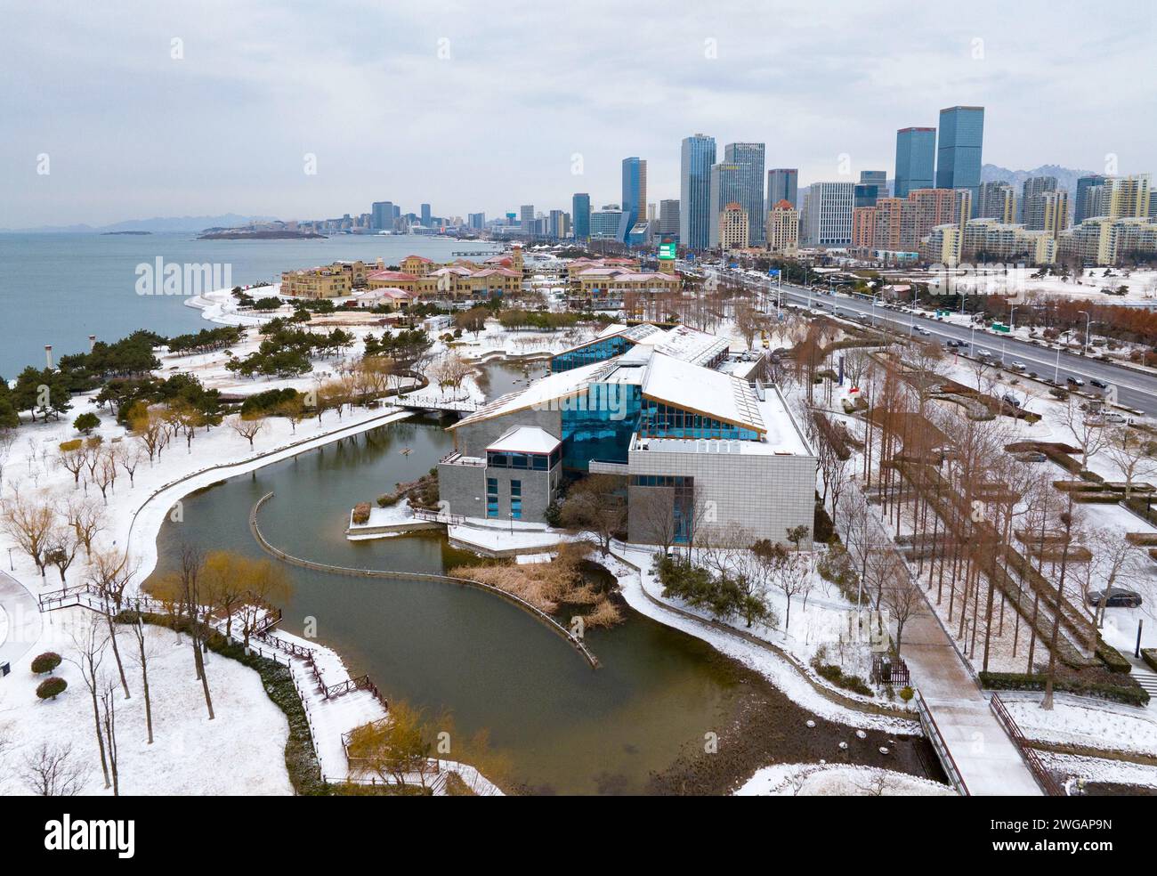Aerial photos show the snow scenery at the West Coast New Area of ...