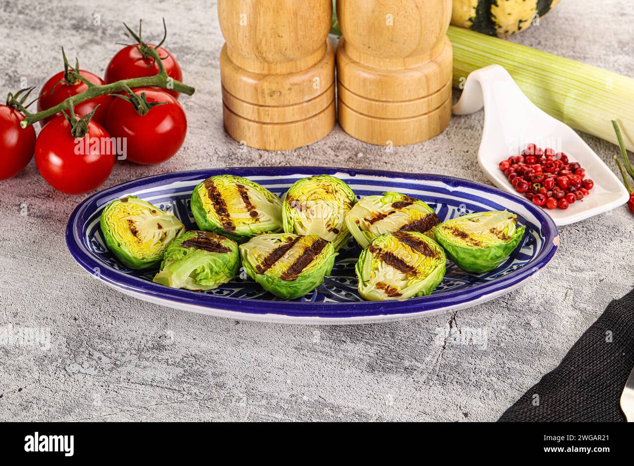 Vegan cuisine Grilled green brussel sprout cabbage Stock Photo - Alamy