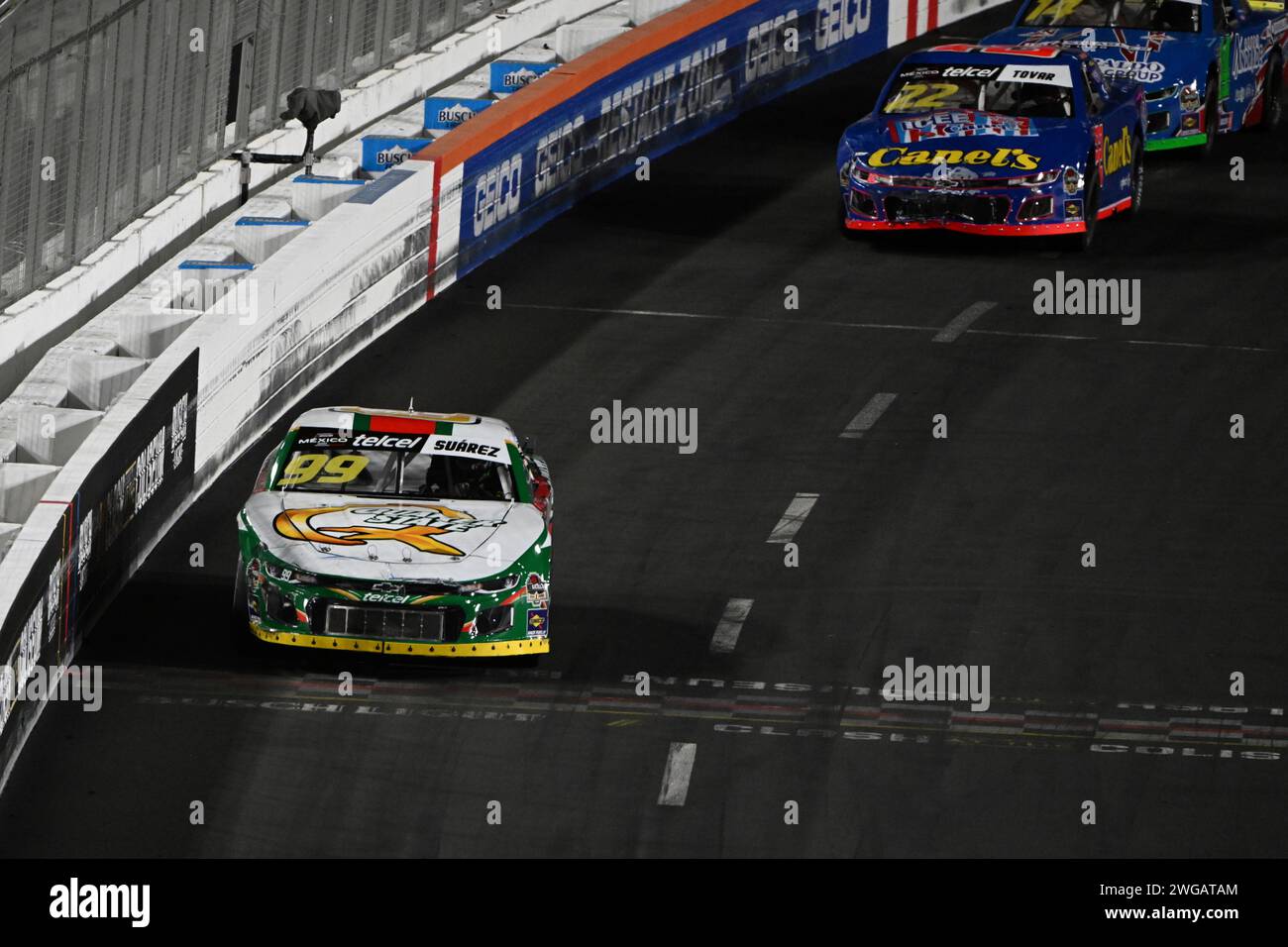 LOS ANGELES, CA - FEBRUARY 03: Daniel Suarez (#99) crosses the finish ...