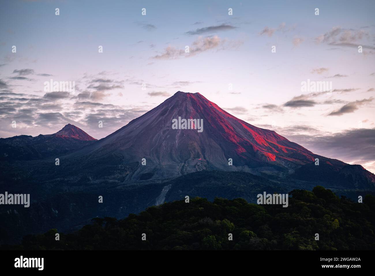 A scenic view of Volcan de Colima at sunrise Stock Photo - Alamy