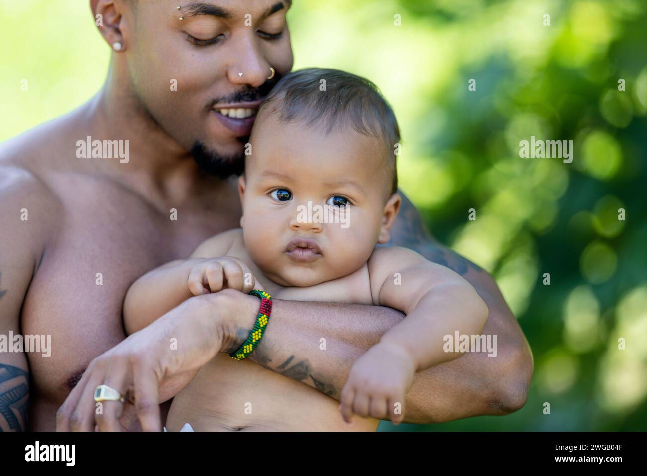 Multiethnic parents and amazed mixed race baby. Mixed race multiethnic ...