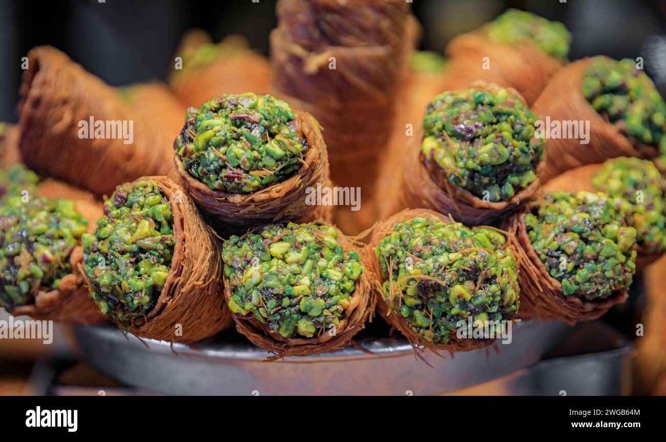 Traditional Turkish dessert, fresh crispy layered pistachio baklava or ...