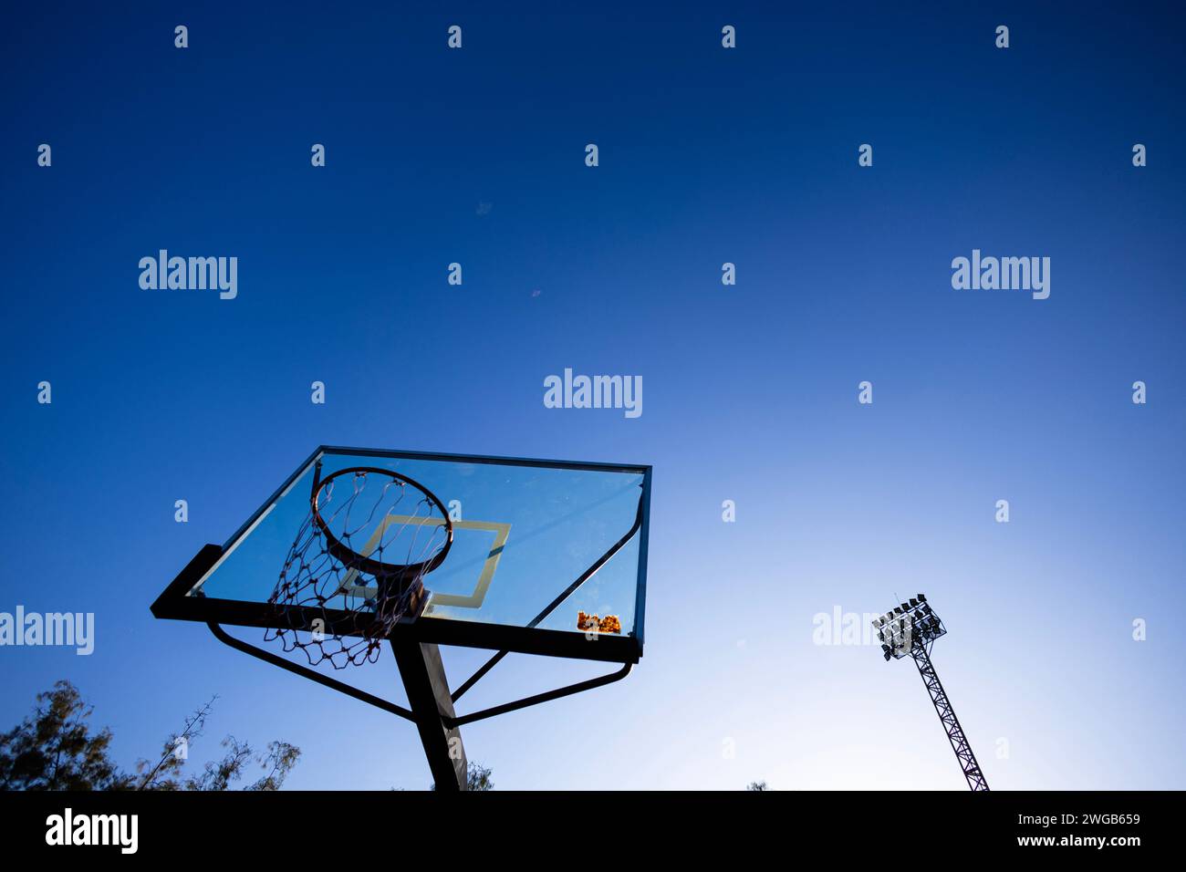 Basketball hoop in the public arena on a blue sky background Stock ...