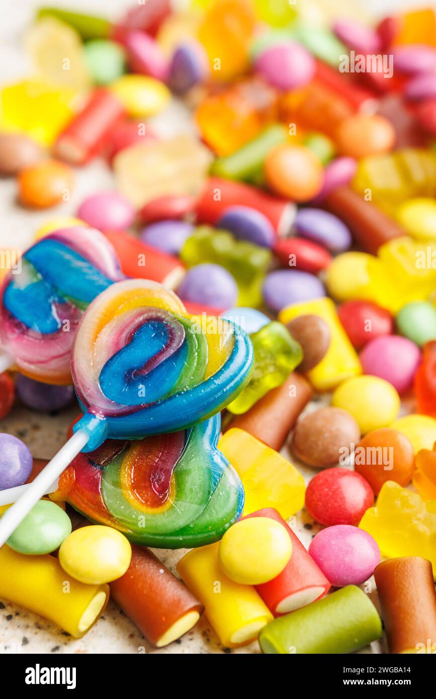 Colorful sweet jelly candies and lollipops. The sweet candies Stock ...