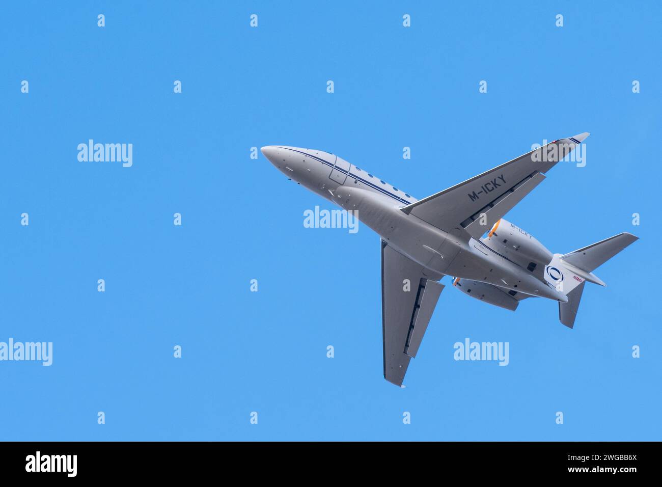 Private jet or small plane in fight against blue sky, a Gulfstream G280 ...