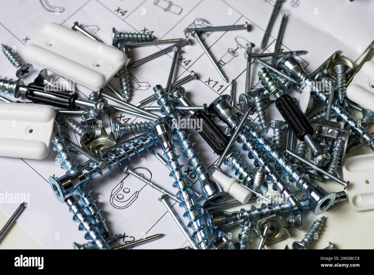 Furniture fittings. Furniture assembly hardware options and tools on a ...