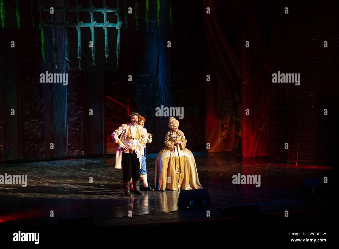 Actresses and actors acting and singing in the musical The Blue Cameo ...