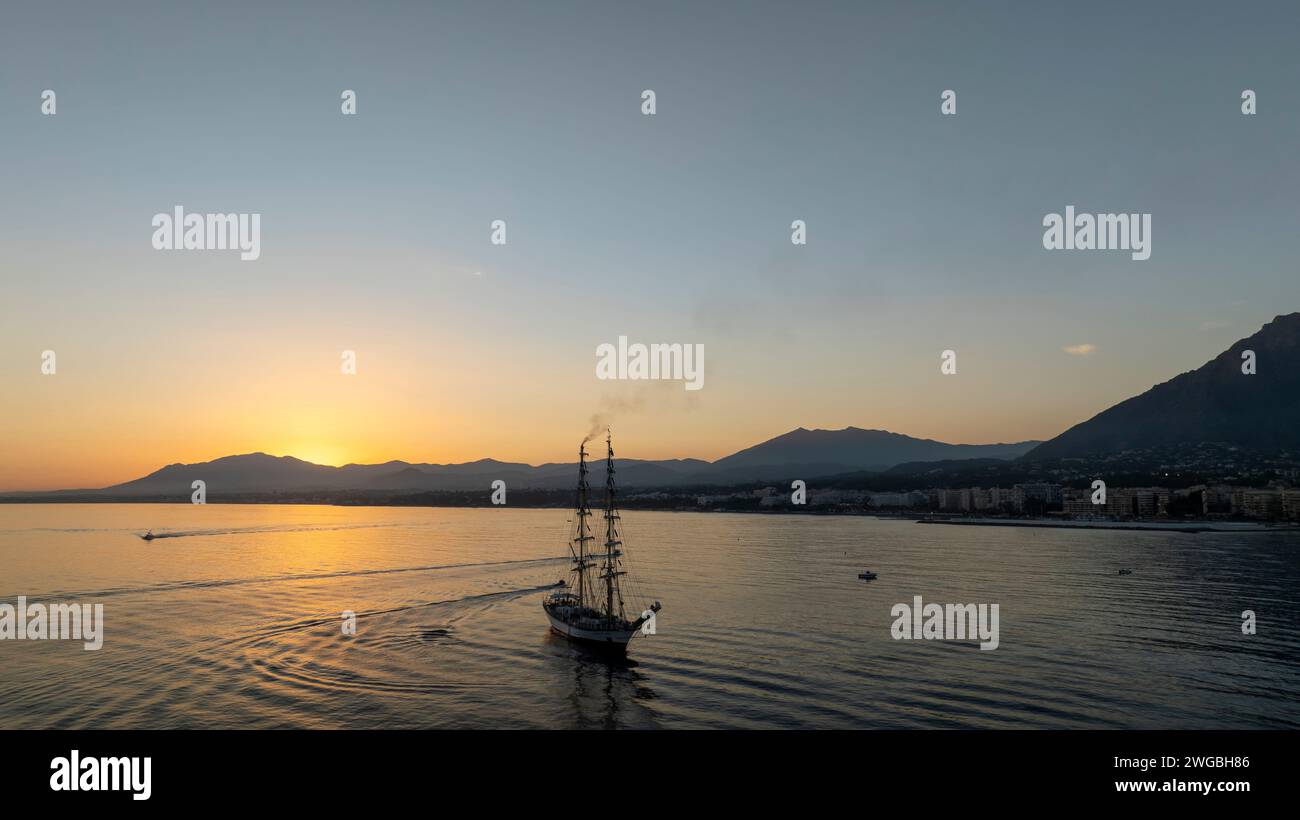 Beautiful sunset on sea ships hi-res stock photography and images - Alamy