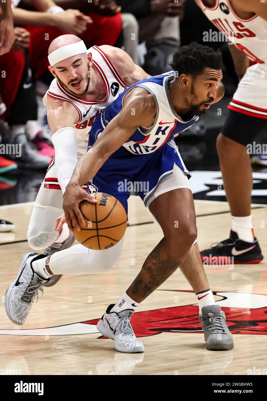 Chicago, USA. 3rd Feb, 2024. Chicago Bulls guard Alex Caruso (L) steals ...
