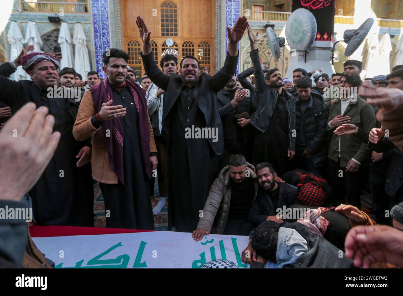 Iraqis attend the funeral of Popular Mobilization Forces fighters ...