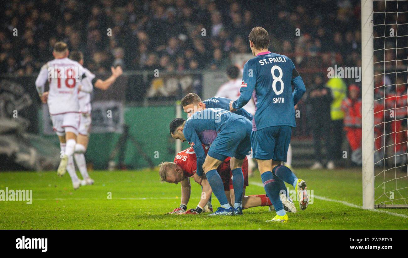 Hamburg, Germany. 30th Jan 2024. Sascha Burchert (Pauli), Manolis ...