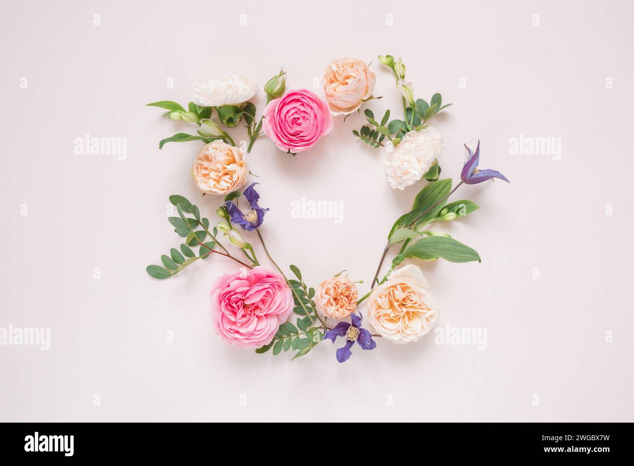 Overhead view of a circular Floral arrangement of roses, chrysanthemums ...