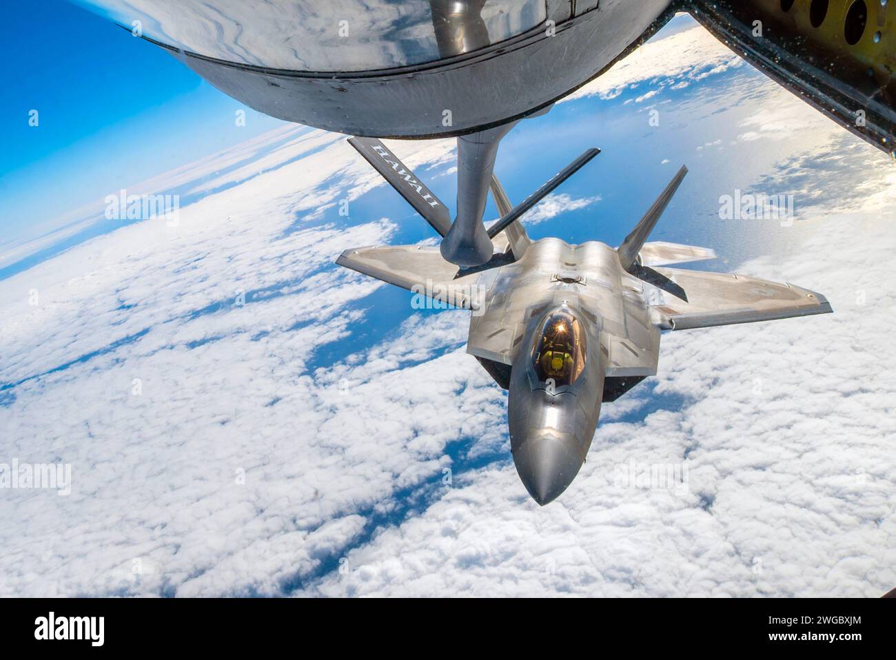 A U.S. Air Force F-22 Raptor aerial refuel during Sentry Aloha 24-01 ...
