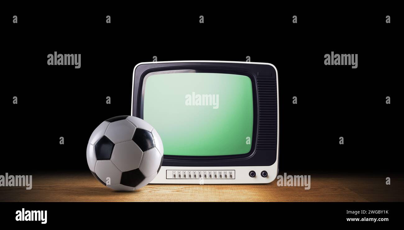 Vintage television and football ball: watch live football championships ...