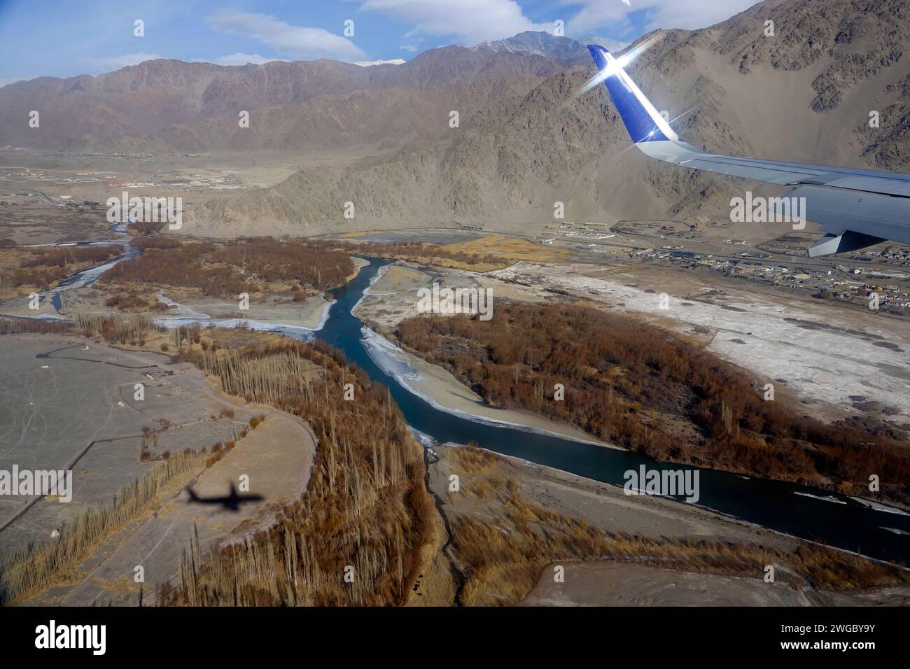 Aerial view of an aircraft wing and shadow, Leh, Ladakh, Indian ...