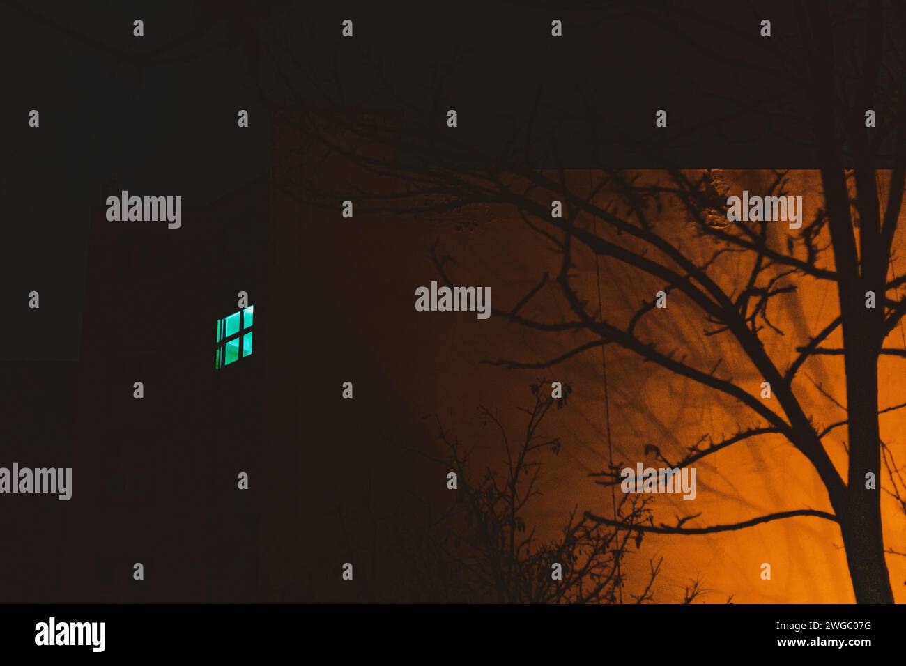 glowing window to the courtyard at night Stock Photo - Alamy