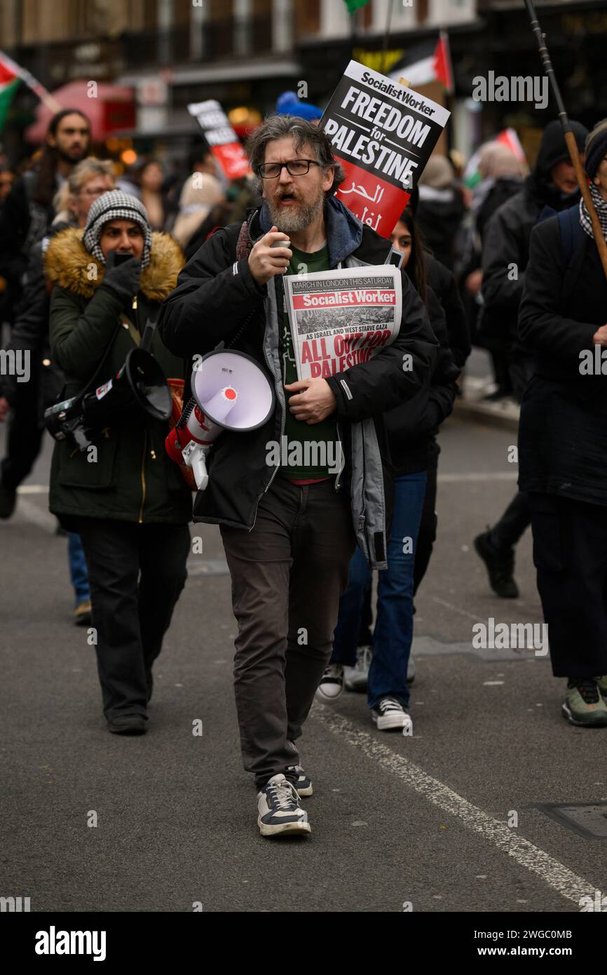 A male demonstrator on a Pro-Palestine march, calling for a ceasefire ...